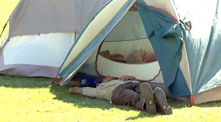 Firefighters sleep in cold tents as temperature drops in California ...