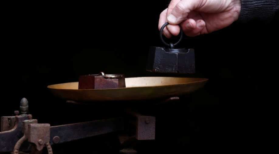 How much does a kilogram weigh? Depends on your 'Planck constant ...