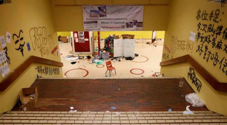 'Too scared to escape': Isolated protesters hold out on trashed Hong ...