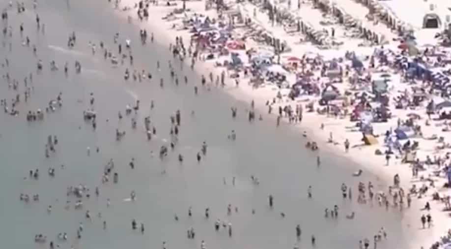 Hundreds pack Florida beach despite coronavirus outbreak in US - World News