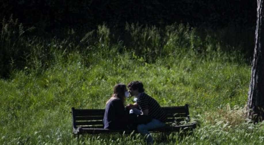 Romance in times of coronavirus: As countries ease lockdown, lovers ...