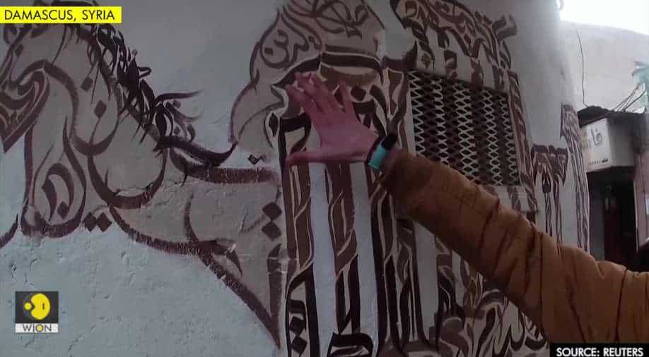 Syrian artist gives new depths to paintings with calligraphy - Edge News