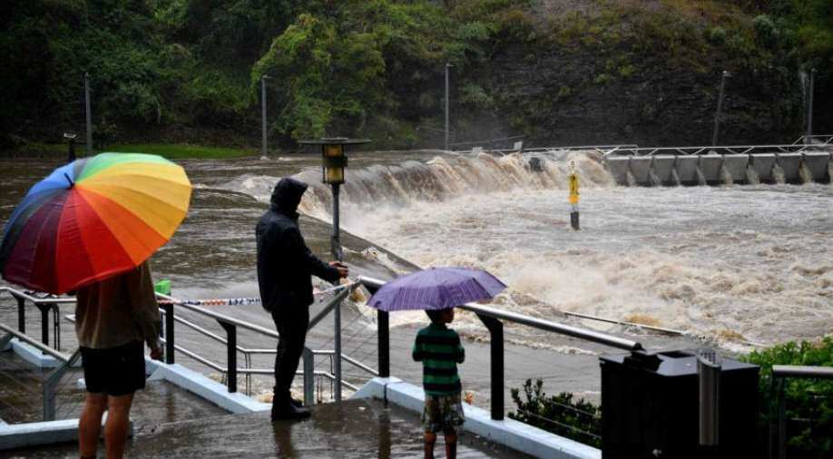 Heavy rain forces evacuations, flood warnings on Australia's east coast ...