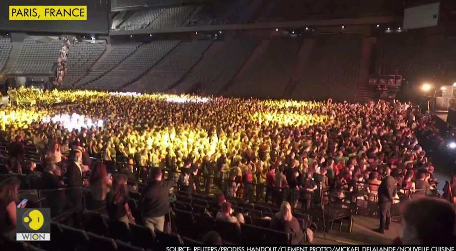 Paris venue hosts indoor rock concert with masks and virus tests, Edge ...