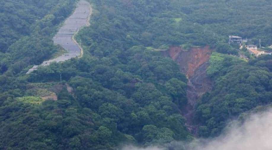 In Pics | Rescuers struggle to locate dozens in landslide-hit Japan ...
