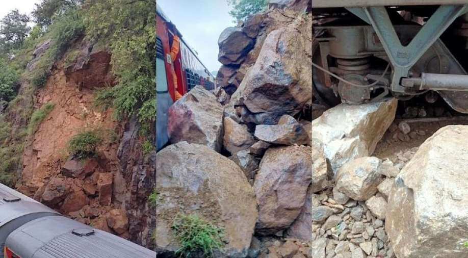 Passengers safe after boulders fall on Indian train damaging coaches ...