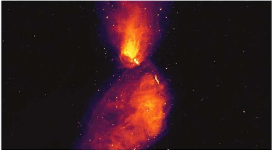 Astronomers capture an erupting black hole 12 million light-years from ...