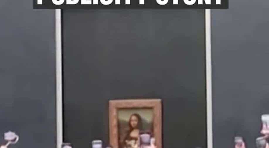 Watch: The famous Mona Lisa painting smeared in cream in climate ...