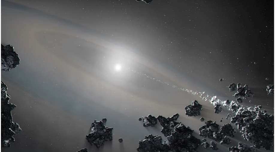 A dead star is ripping apart its planets in 'cosmic cannibalism ...