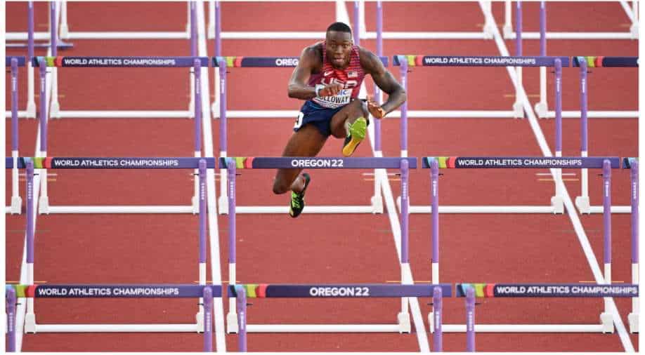 America's Grant Holloway retains 110m hurdles title after Jamaica's ...