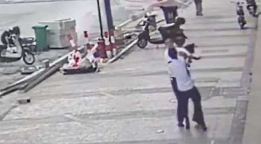 Watch: Man catches toddler after she falls from fifth floor building as ...