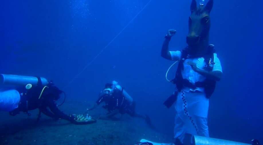 Scuba divers play a game of 'Underwater Chess', as India hosts 44th Int ...