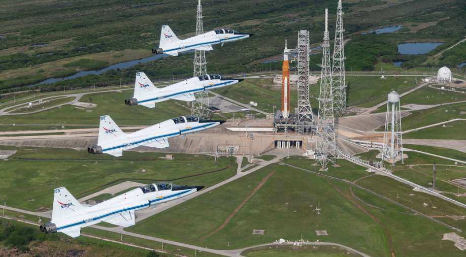 Watch: NASA T-38 trainer jets fly in formation above SLS megarocket ...