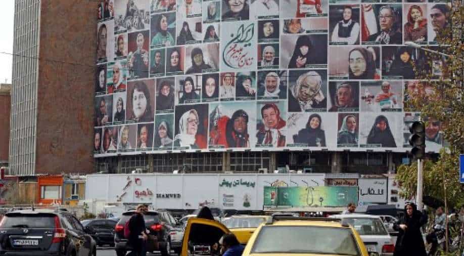 Iran: Billboard featuring famous women in hijab changed after ...