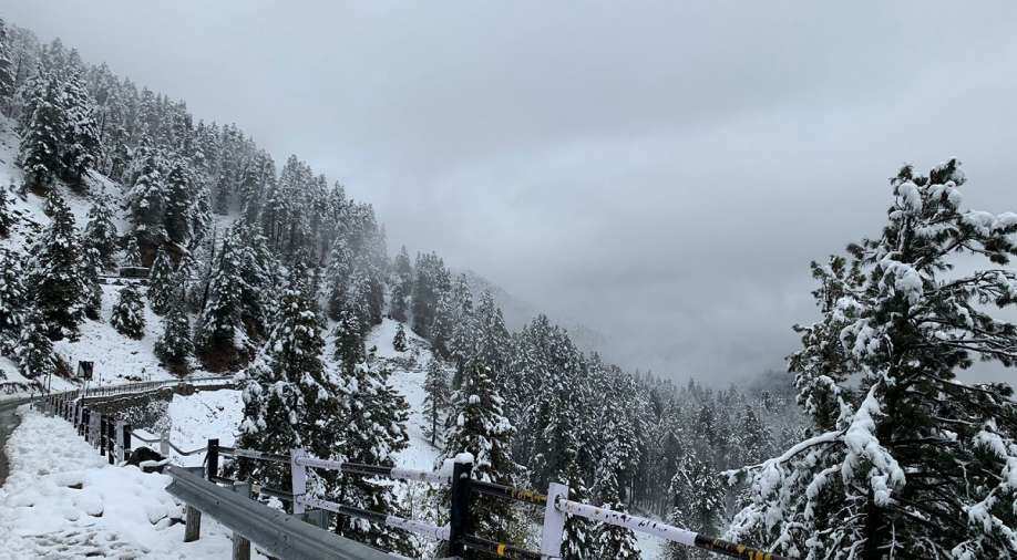 Kashmir receives seasons first major snowfall - In pictures - Photos News