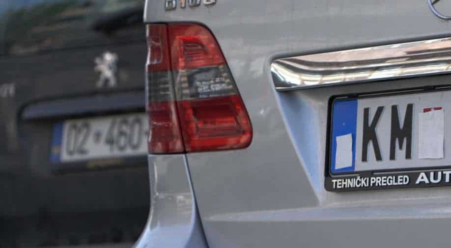Kosovo and Serbia agree to end long-standing dispute over car licence ...