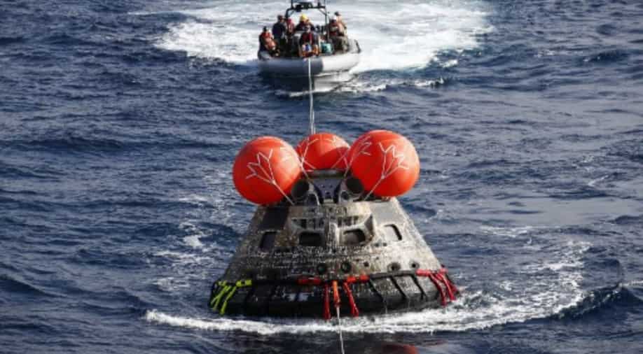 NASA's Orion capsule returns to Earth following a record voyage around ...