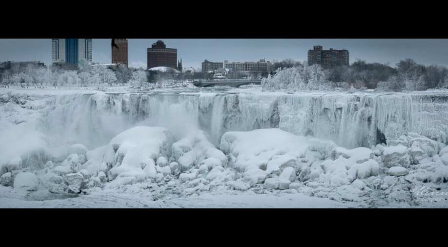 In pics | Niagara falls partially freezes over after 'blizzard of the ...