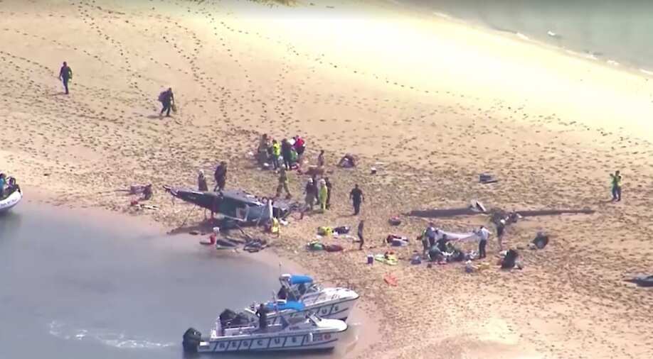 Two helicopters collide mid-air on Australia's Gold Coast leaving four dead - World News