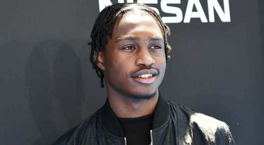 Lil Tjay arrested for gun possession in NYC months after he was shot ...