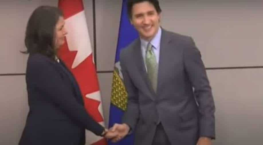 WATCH | Canada PM Trudeau meets Alberta premier with an awkward ...