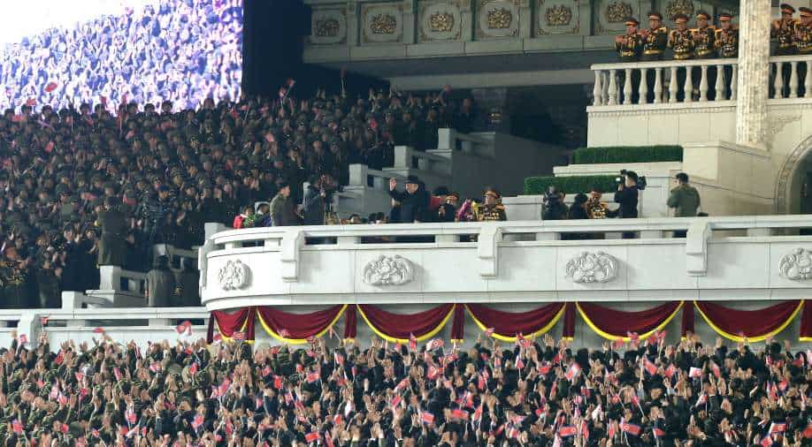 In pics: North Korea displays its military strength at night-time ...