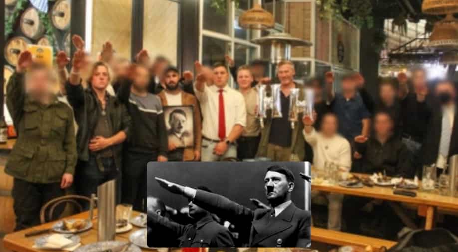 Group of neo-Nazis celebrates Hitler's birthday, raise their arms to ...