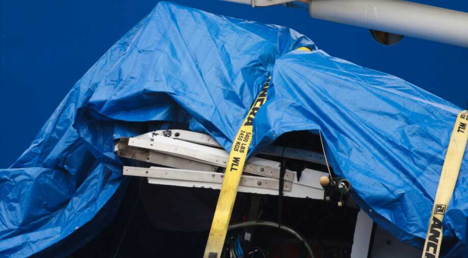 Pieces of Titan submersible brought to shore - World News