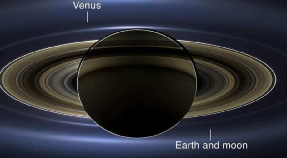 NASA revisits iconic Saturn pic, and Earth is photobombing - Science News