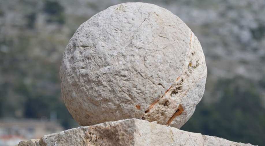 Our prehistoric ancestors turned stones into spheres for a reason, says ...
