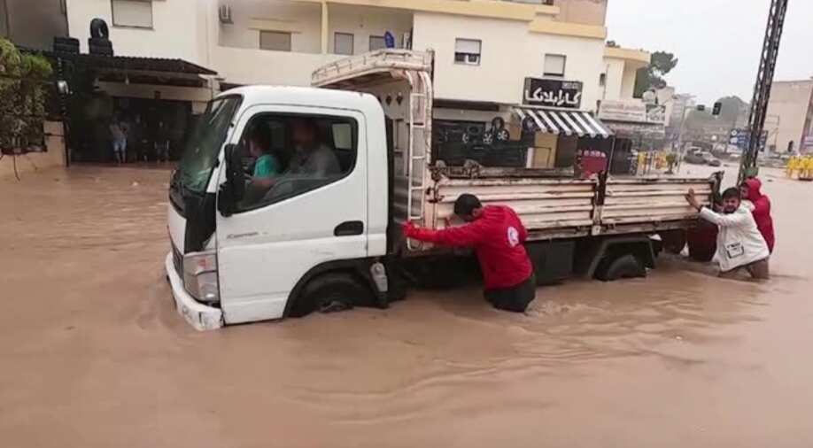 In pics | Libya: Over 2,000 dead as floods wipe out quarter of Derna ...
