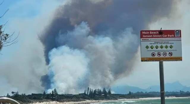 Out-of-control bushfire engulfs area near famous Australian beach in ...