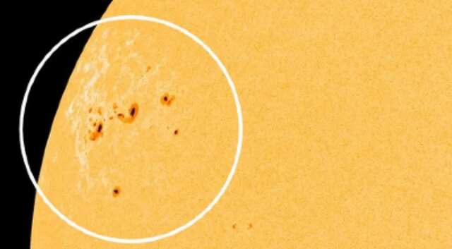Cluster of dark spots 15 times wider than Earth spotted on Sun ...